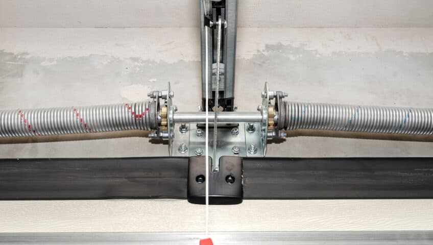 How Cold Weather Impacts Garage Door Springs & Motors